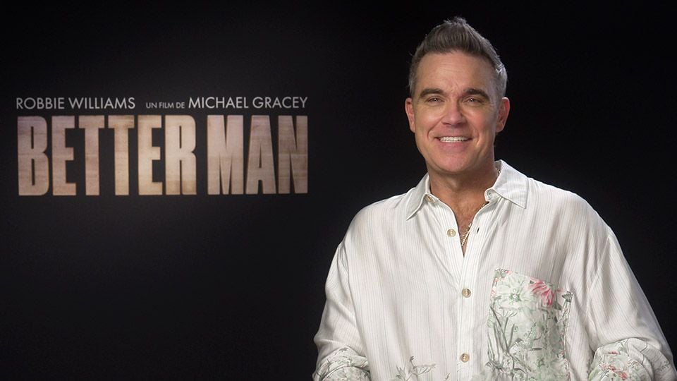 Vidéo interview pour Better Man : Rencontre avec Robbie Williams pour ...